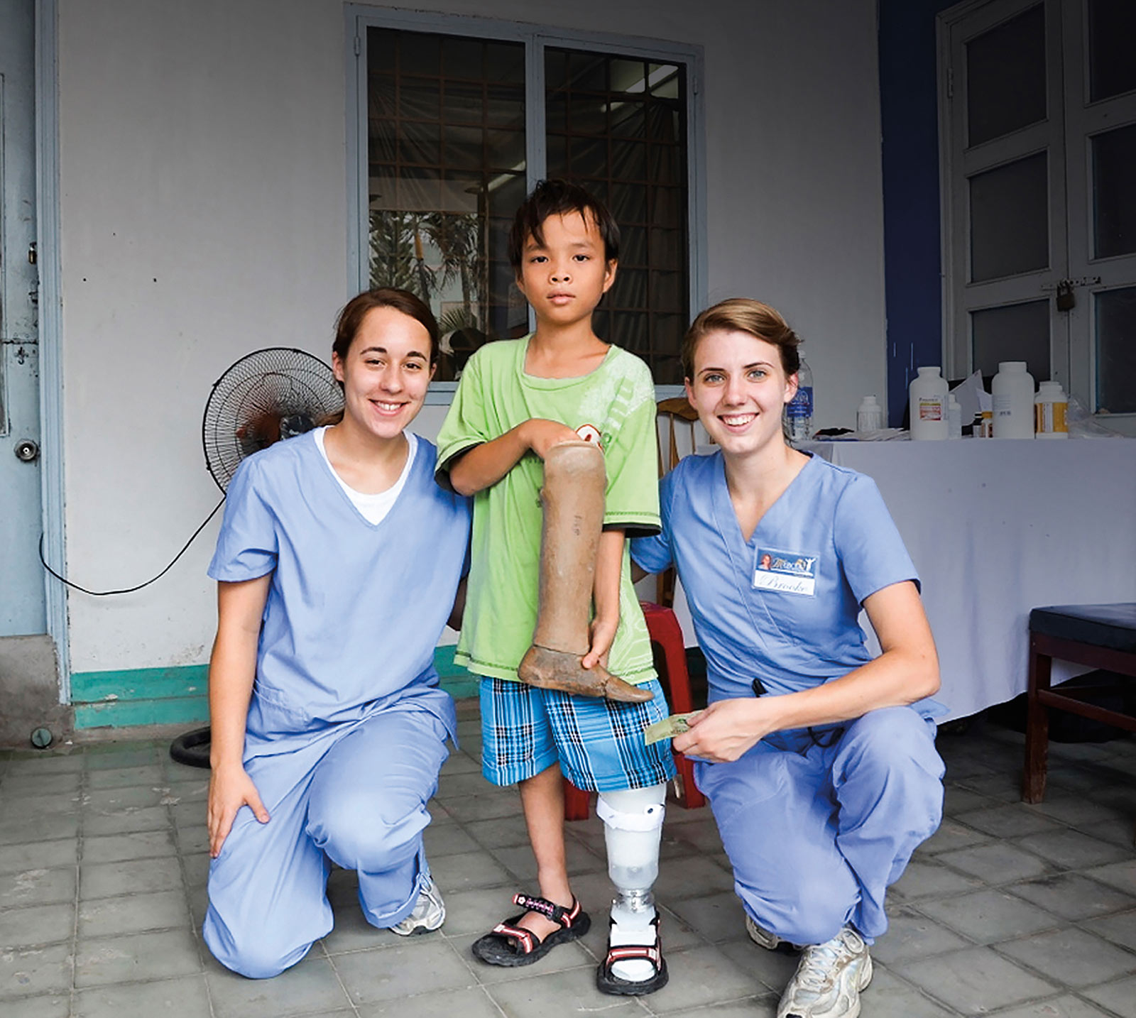 Mercer fits amputees with prosthetic legs in Vietnam