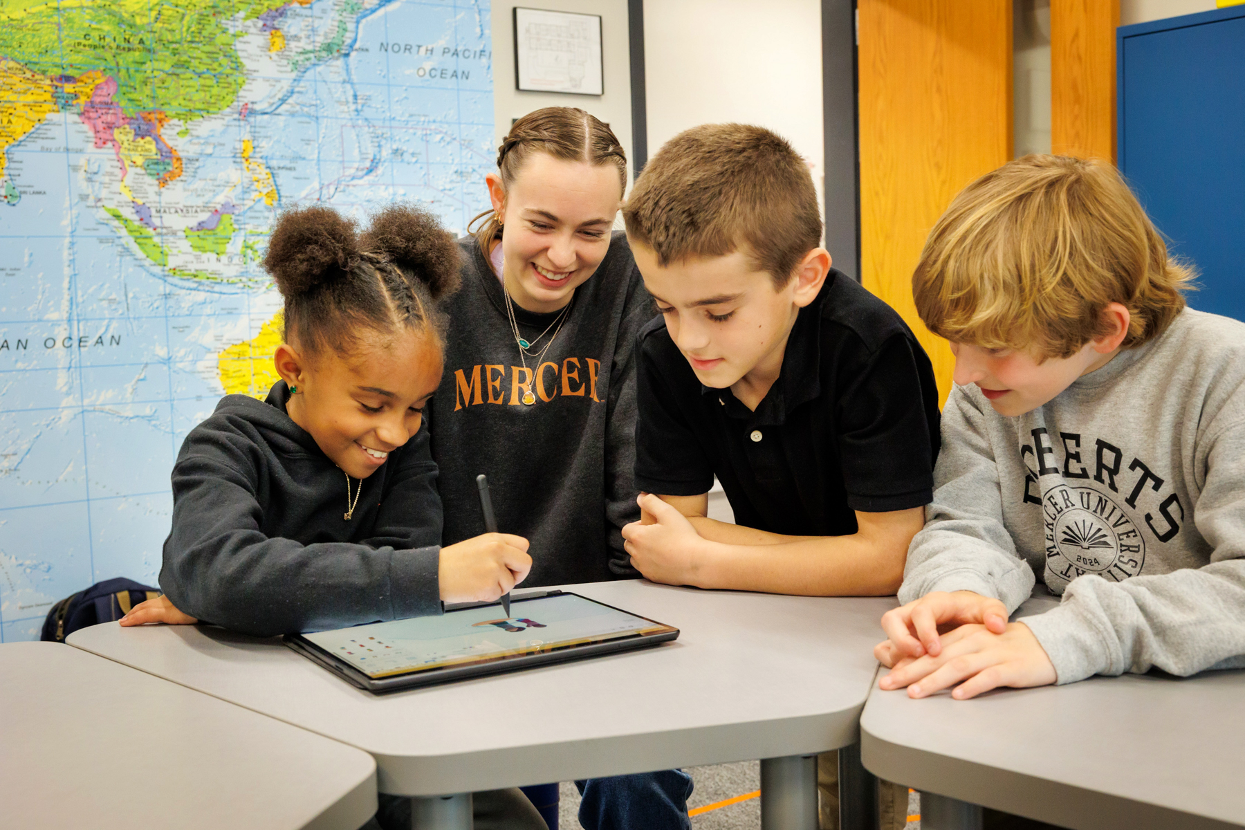 Mercer students create activities for Roberts Academy learners